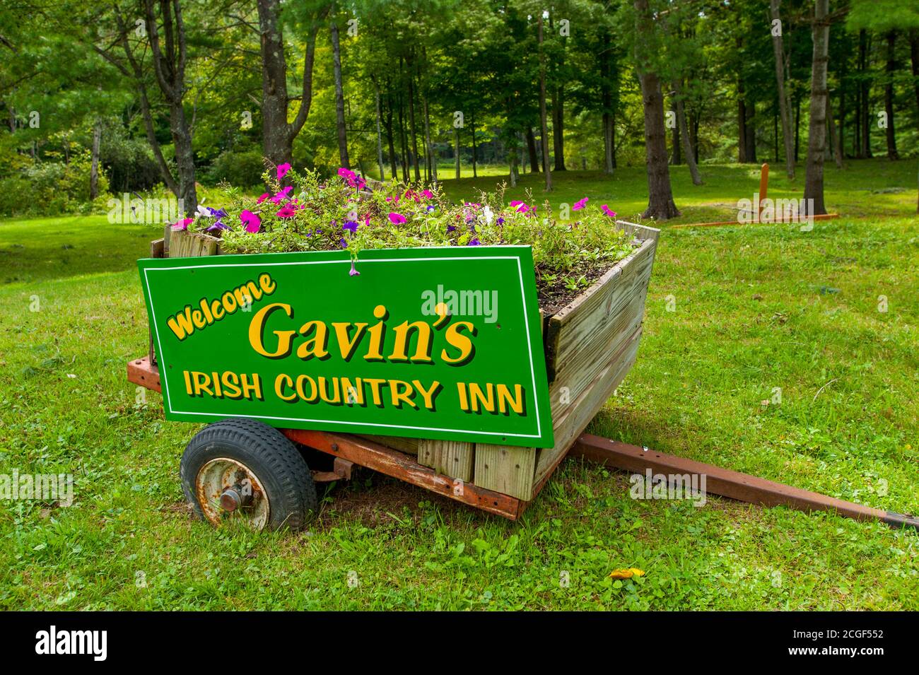 A wagon planted with flowers used as a sign for the Gavin Stock Photo ...