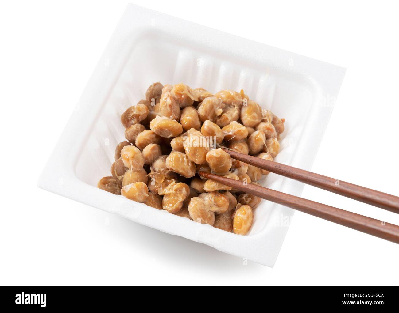 Natto packets and chopsticks on a white background Stock Photo - Alamy