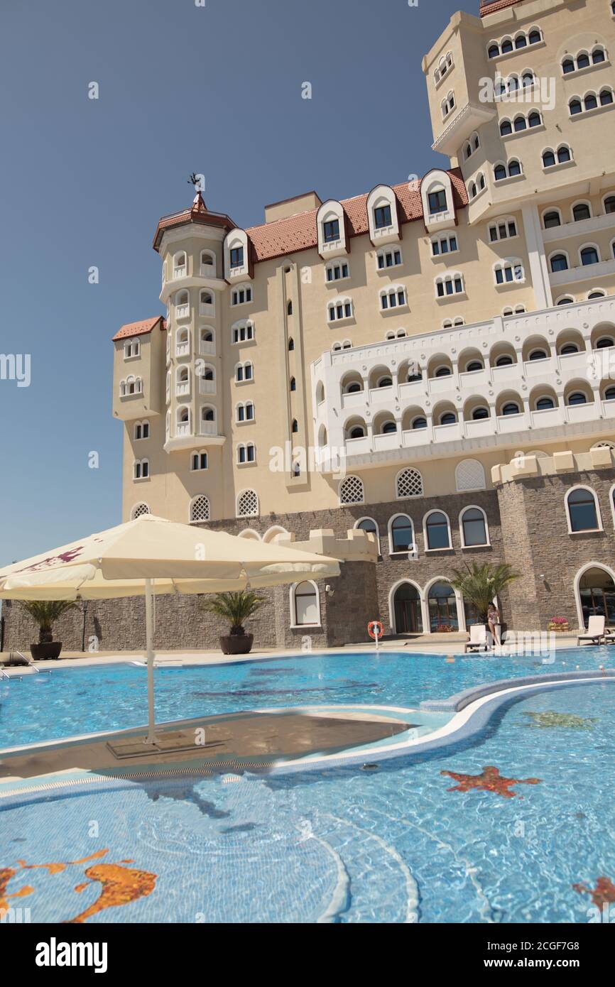 Luxury resort built as castle with large amazing swimming pool at a day ...