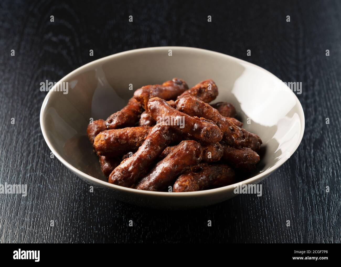 Japanese sweets (karinto) on a black background Stock Photo - Alamy