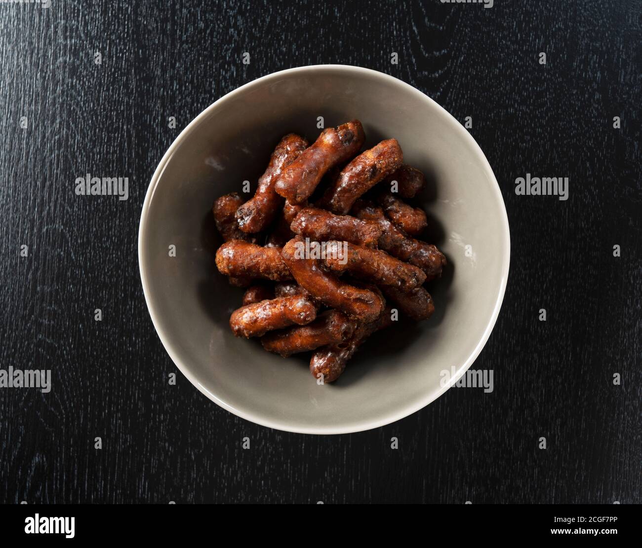 Japanese sweets (karinto) on a black background Stock Photo - Alamy