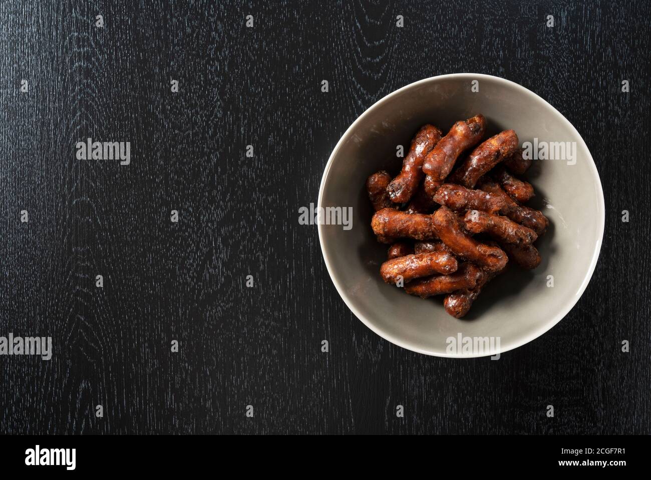 Japanese sweets (karinto) on a black background Stock Photo - Alamy