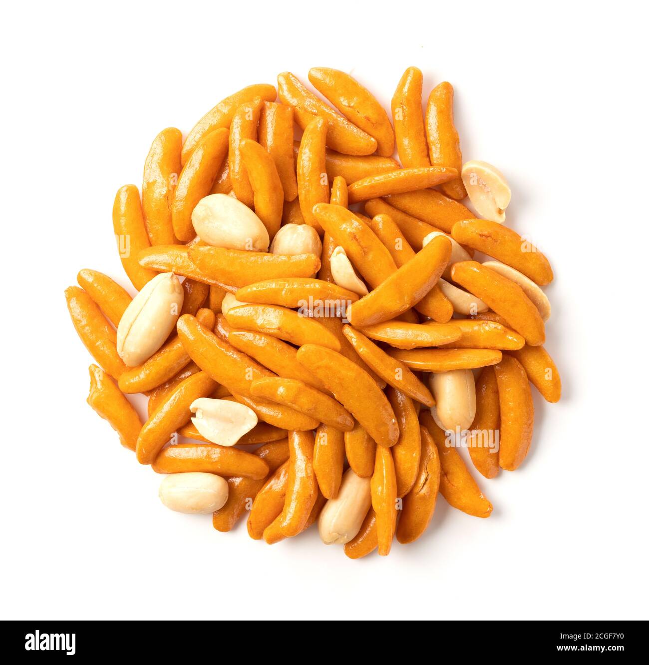 crispy rice crackers with roasted peanuts placed on a white background ...