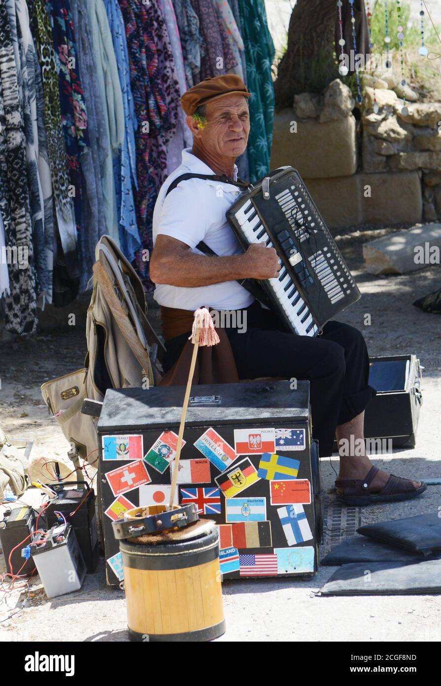 A Maltese man playing his accordion in Gozo, Malta Stock Photo - Alamy