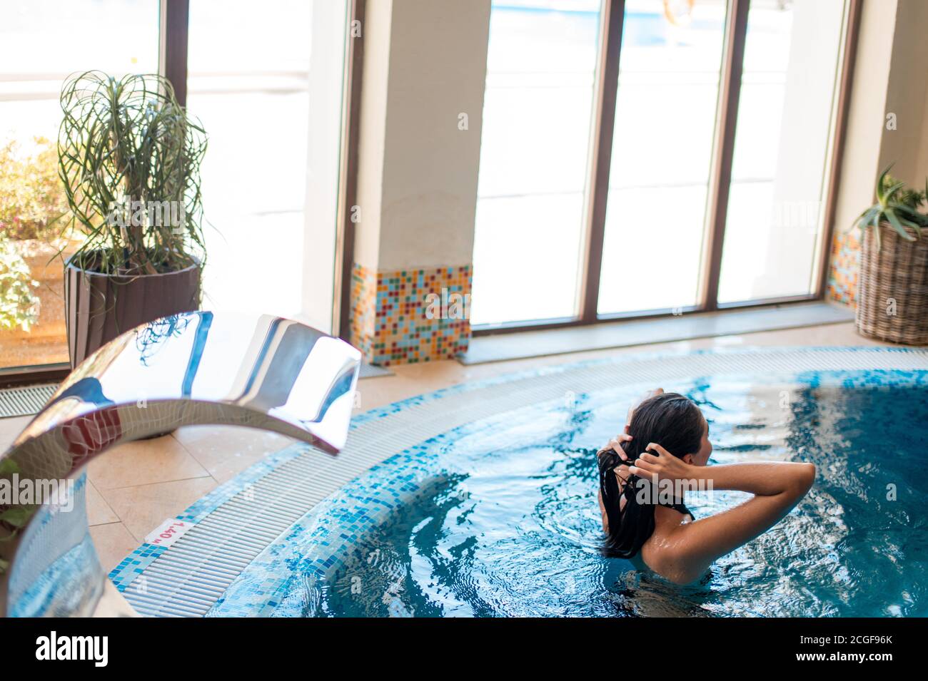 Woman sleeping pool hi-res stock photography and images - Alamy