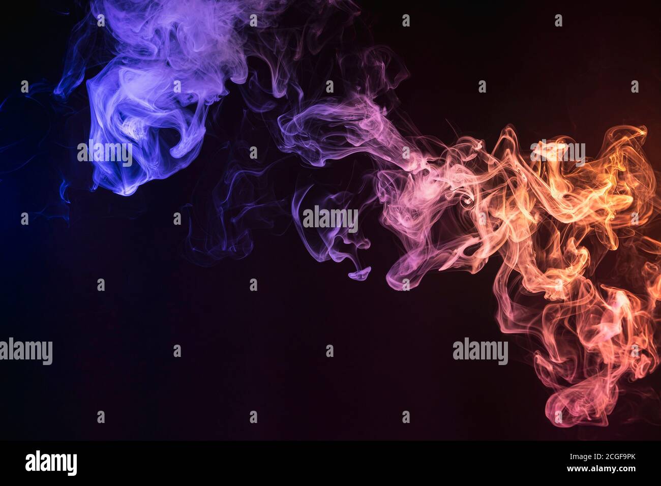 Pattern, Neon pink, blue and purple smoke in the on a dark isolated ...