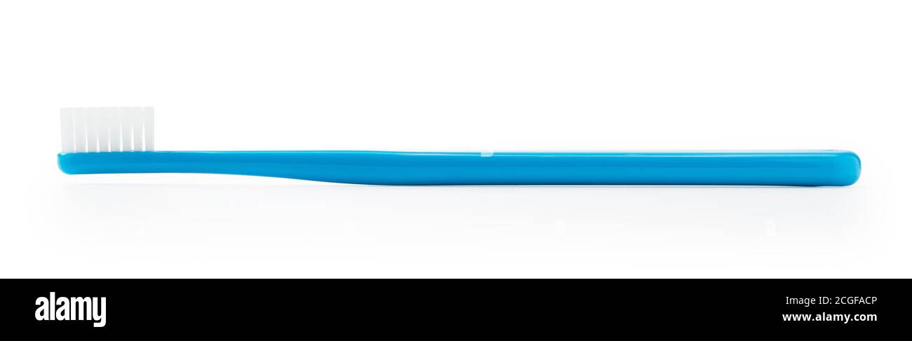 Blue toothbrush on a white background Stock Photo - Alamy