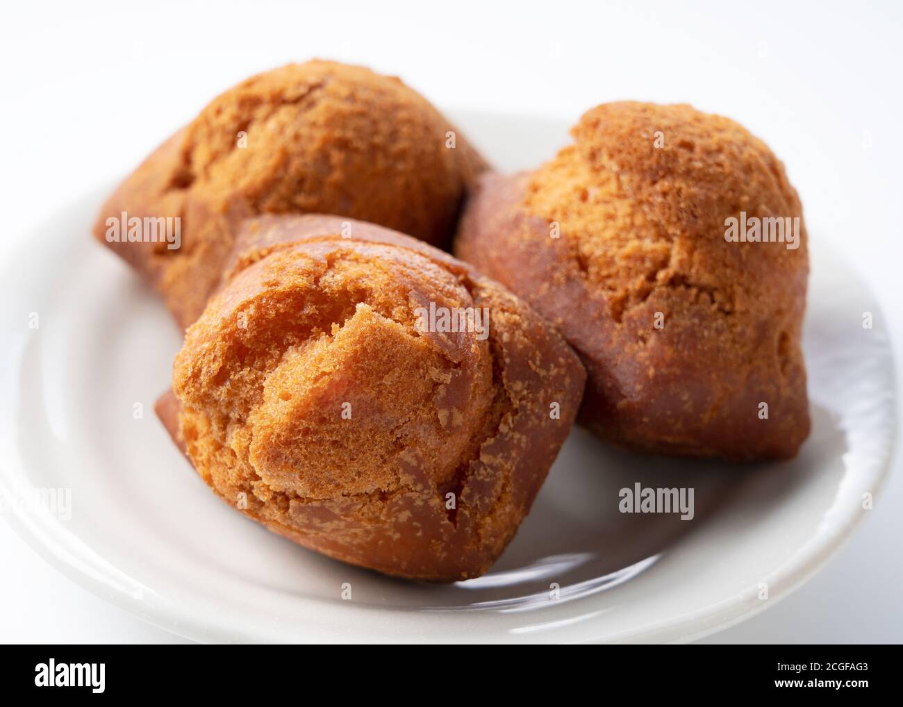 Okinawan Saater andagi on a white background Stock Photo - Alamy