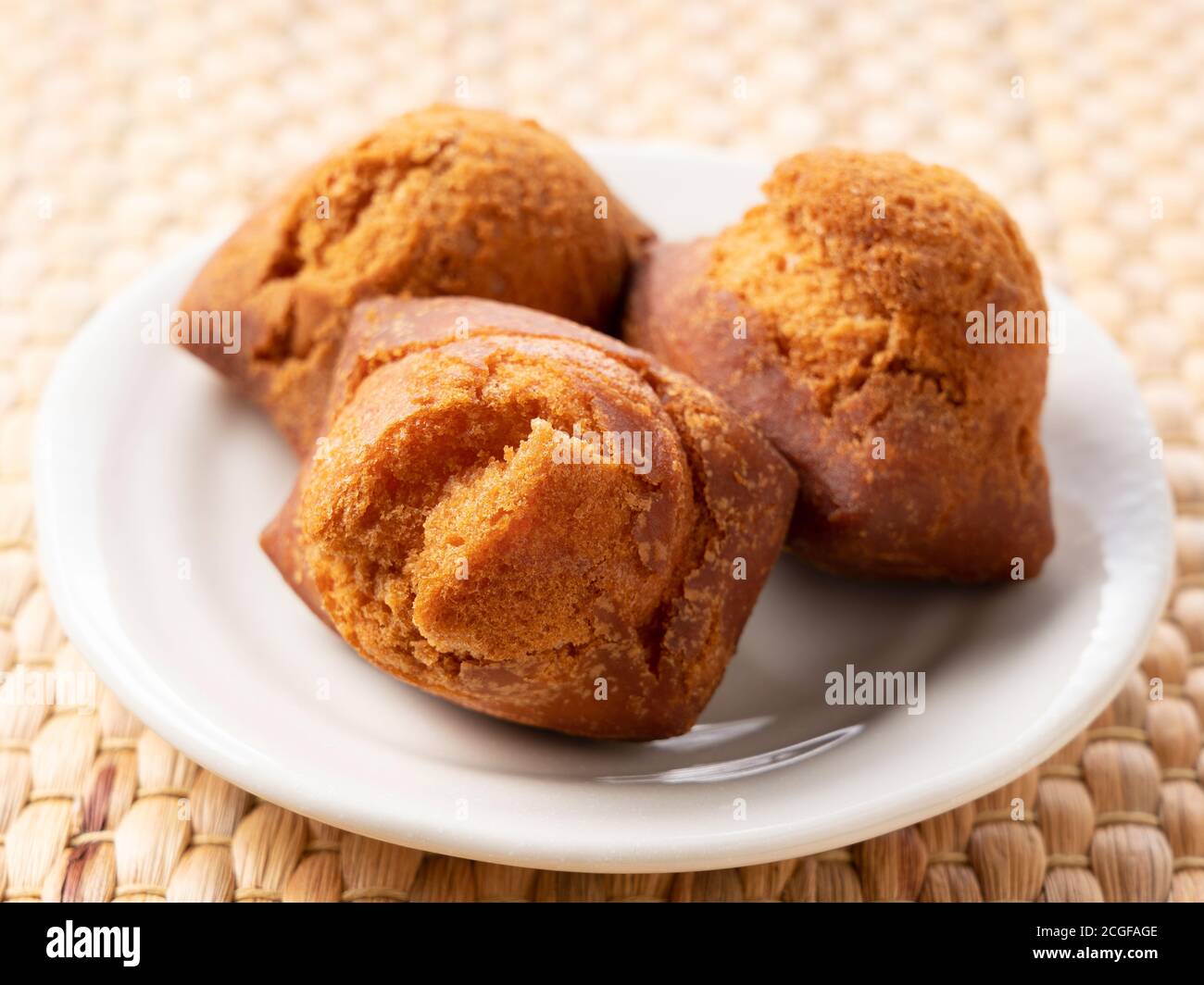 Okinawan Saater andagi on a Japanese luncheon mat Stock Photo - Alamy
