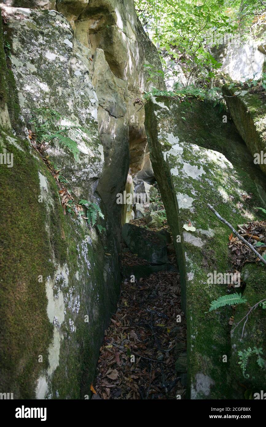 Narrow passage between two rocks with selective focus Stock Photo - Alamy