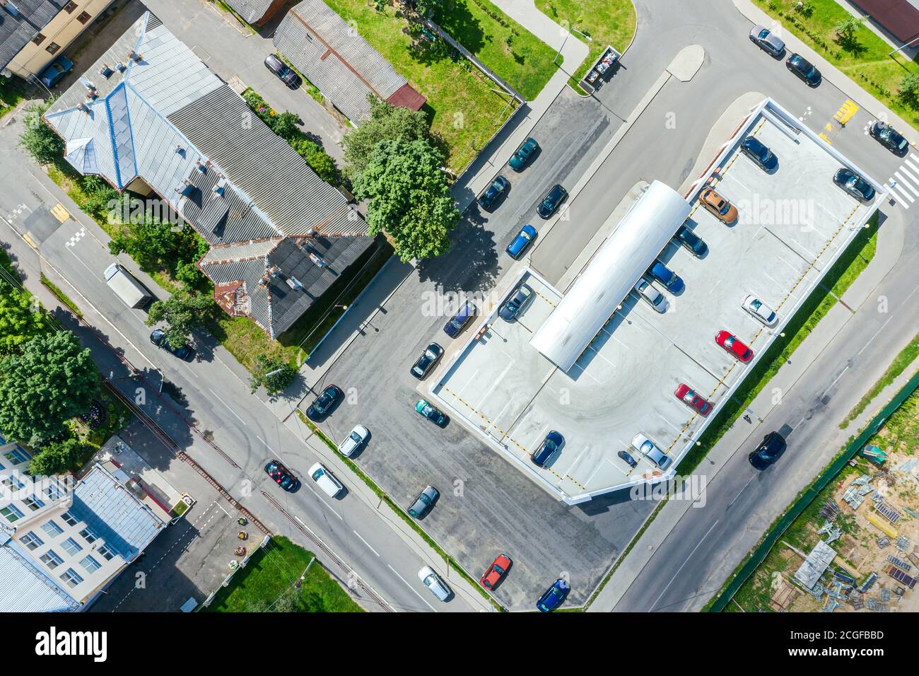 aerial view of multilevel parking garage with outdoor parking space ...