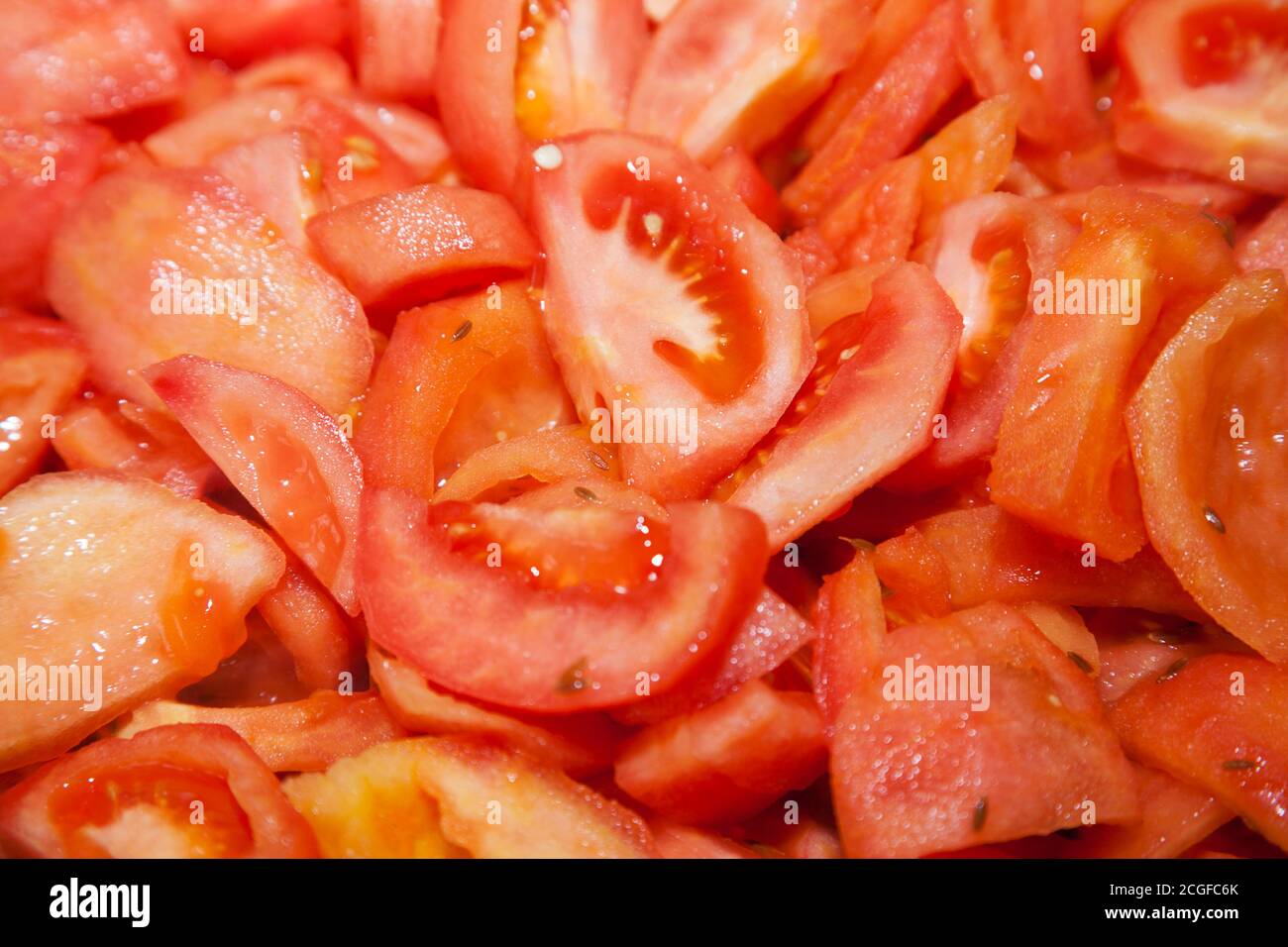 Closeup of peeled and sliced fresh tomatoes Stock Photo - Alamy