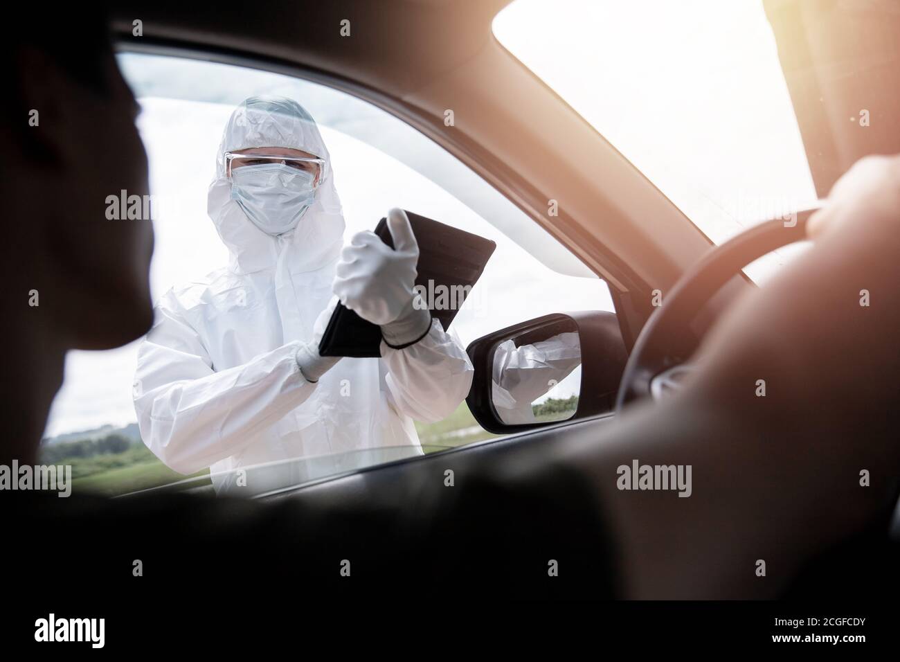 Checking and disinfecting car for virus COVID-19 and bubonic plague ...