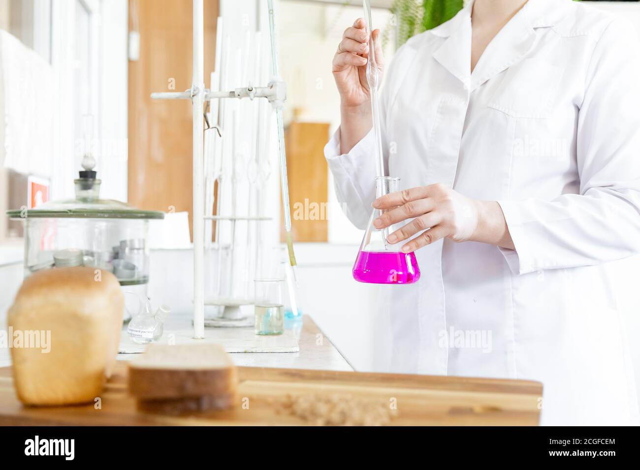 Laboratory analysis of production and baking bread. Control finished ...