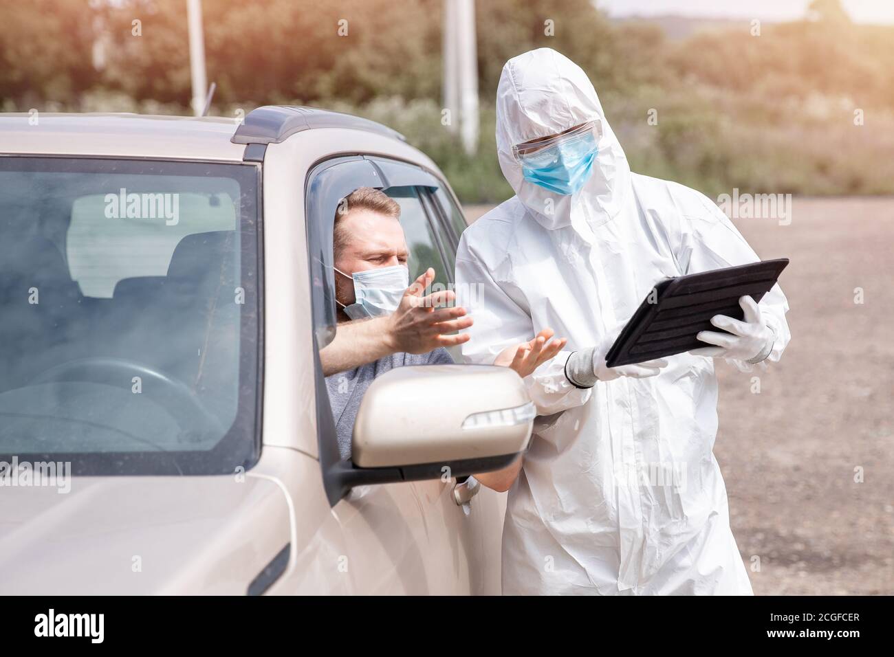 Checking and disinfecting car for virus COVID-19 and bubonic plague ...