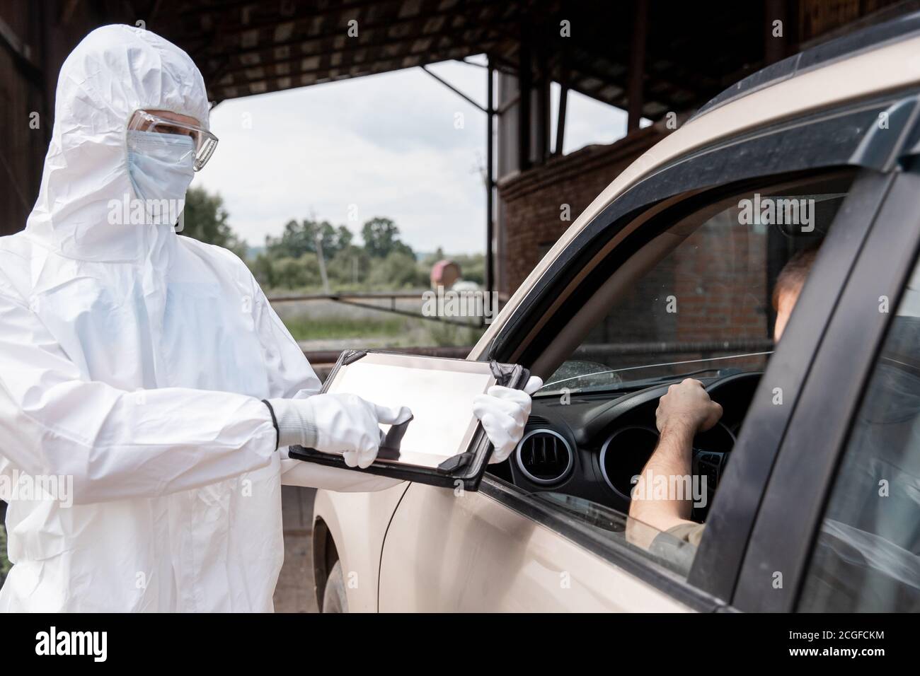 Checking and disinfecting car for virus COVID-19 and bubonic plague ...