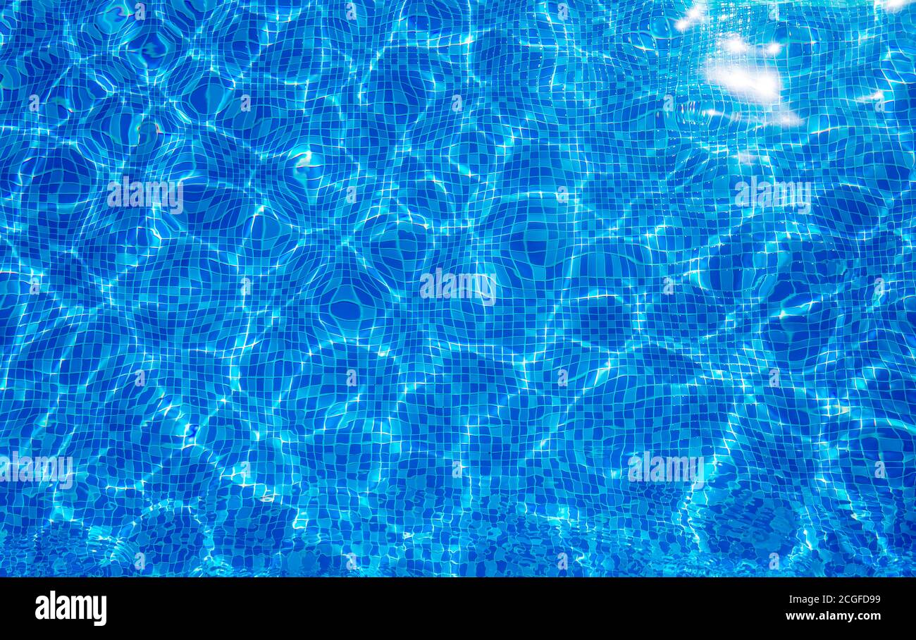 Background texture surface of blue swimming pool of water with ...