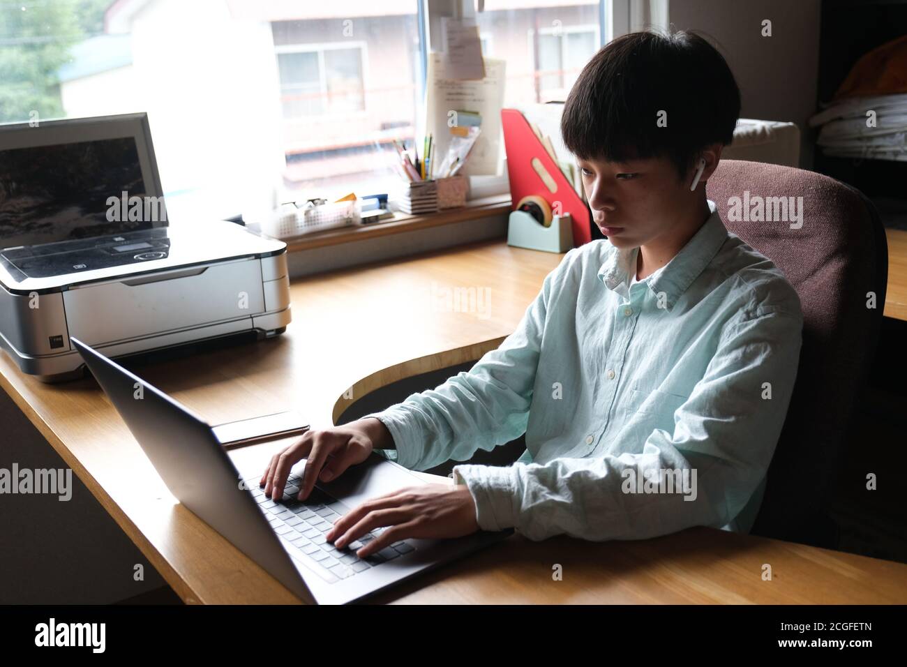 Asian office telework hi-res stock photography and images - Alamy