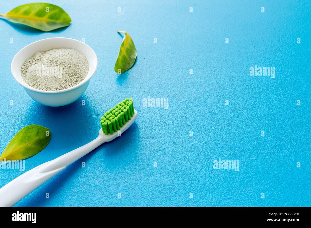 Herbal dental tooth powder with toothbrush. Health care and hygiene ...