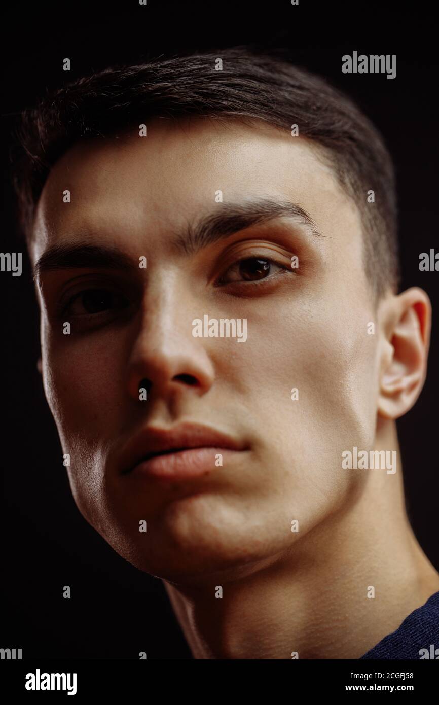 Close up portrait of good-looking serious man with healthy clean skin ...