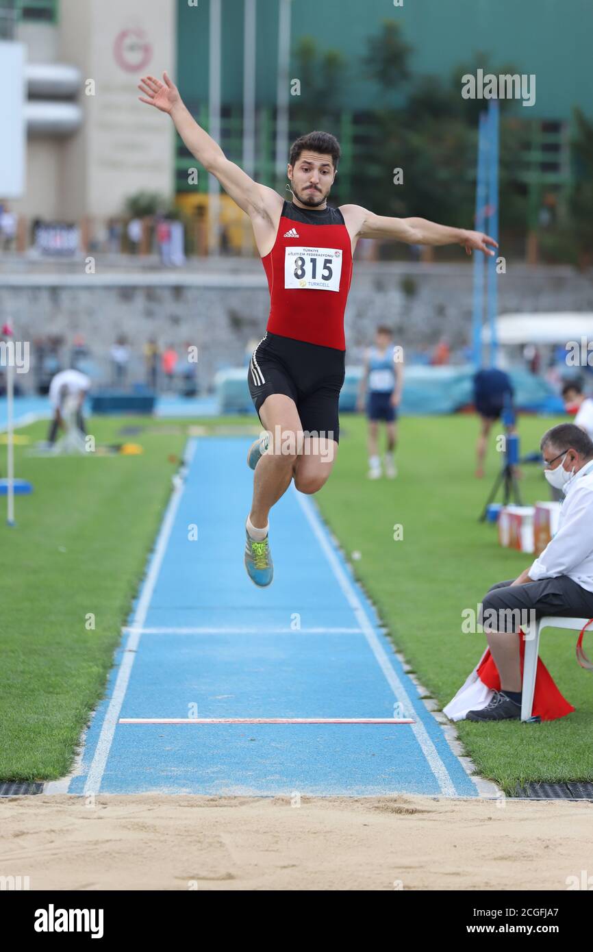 ISTANBUL, TURKEY - SEPTEMBER 04, 2020: Undefined athlete long jumping ...