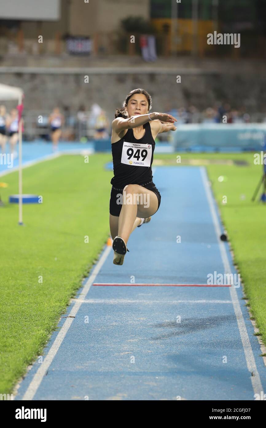 ISTANBUL, TURKEY - SEPTEMBER 04, 2020: Undefined athlete triple jumping ...
