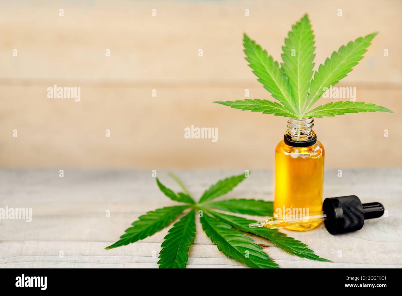 Concept medical marijuana. Oil Cannabis CBD extracts formula in jars herb and leaves Stock Photo ...