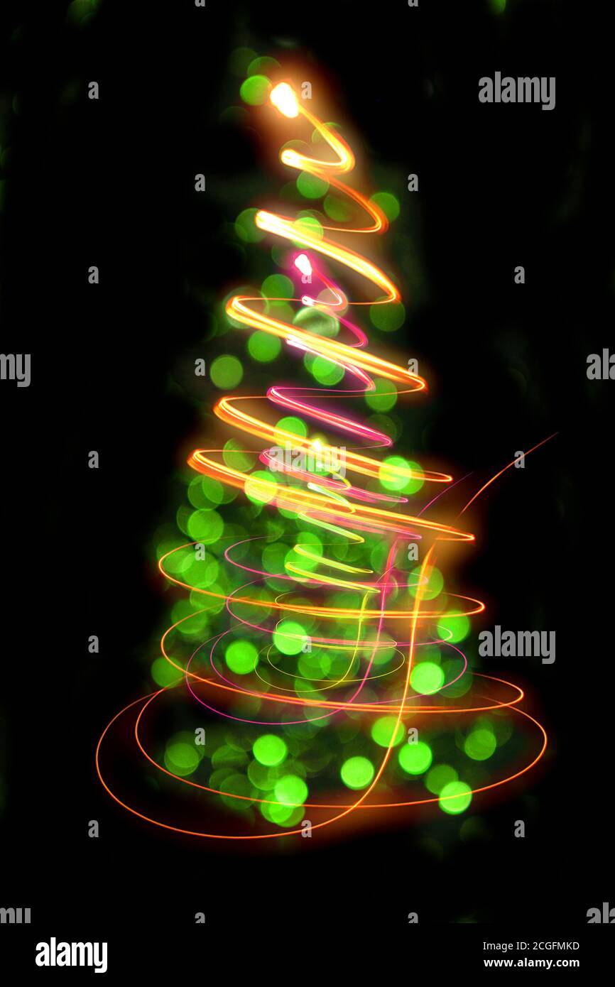 christmas tree (color lights) in the dark night Stock Photo - Alamy