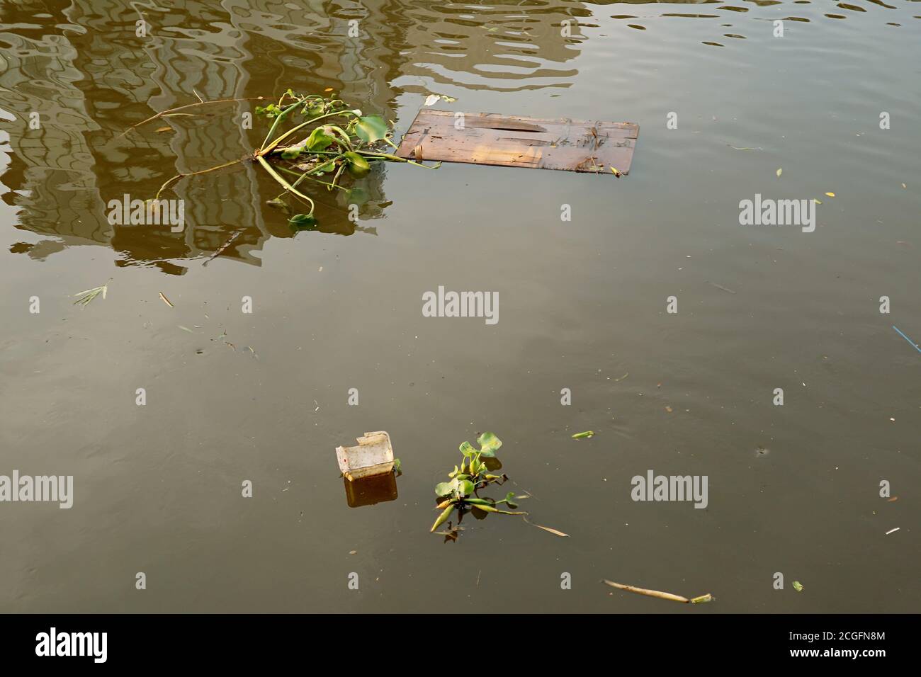 Garbage floating on the river for the concept of water pollution Stock ...