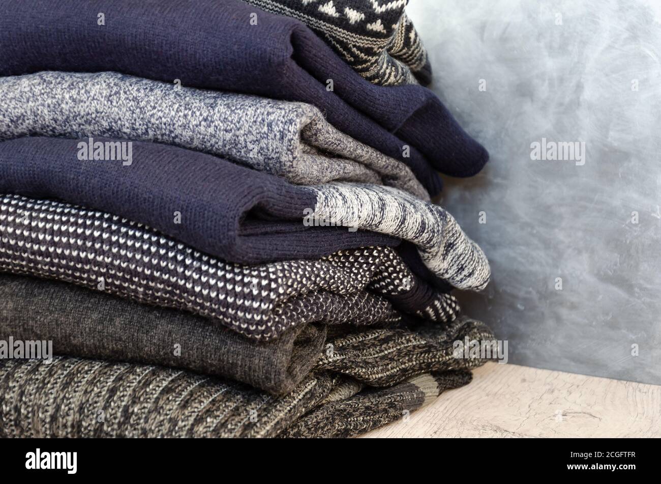 Navy jumper folded hi-res stock photography and images - Alamy