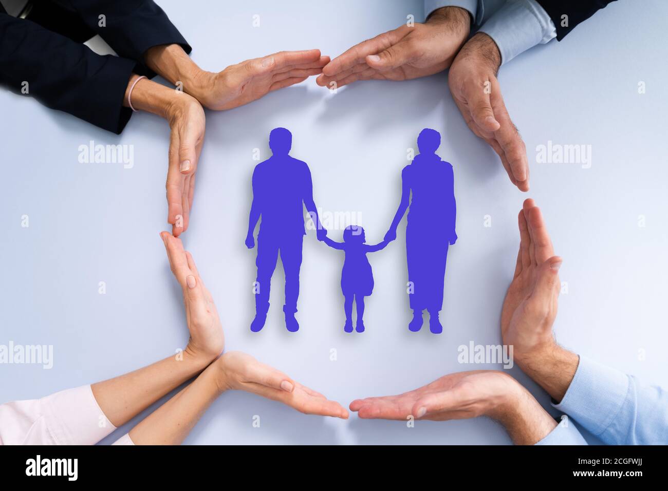 Diverse Group Of People Protecting Family. Safety And Insurance Stock ...