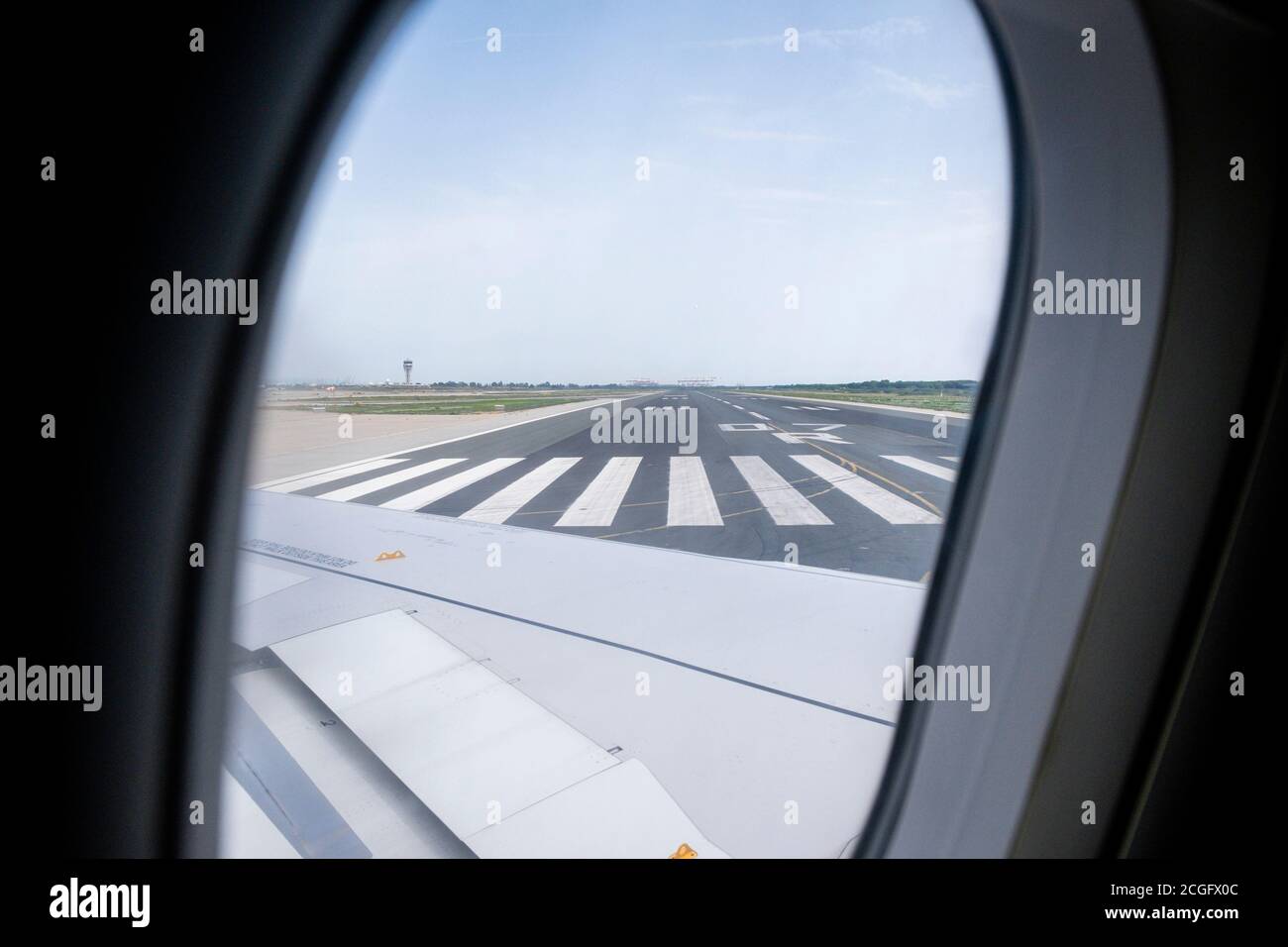 View from the cabin window of a jet airliner as it moves towards the ...