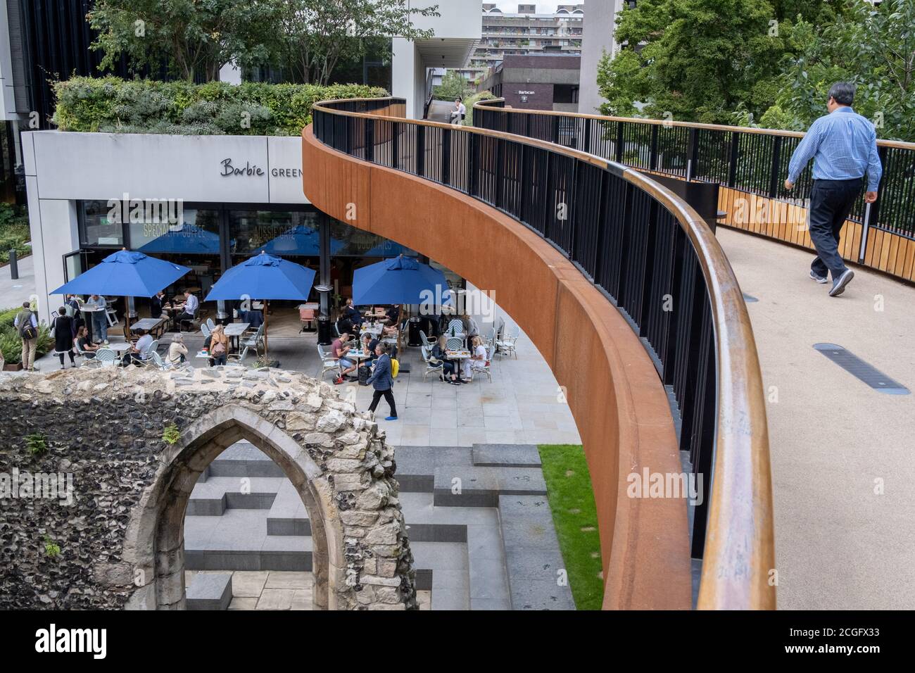 The ruined arches of St Alphage church and the modernist St. Alphage ...