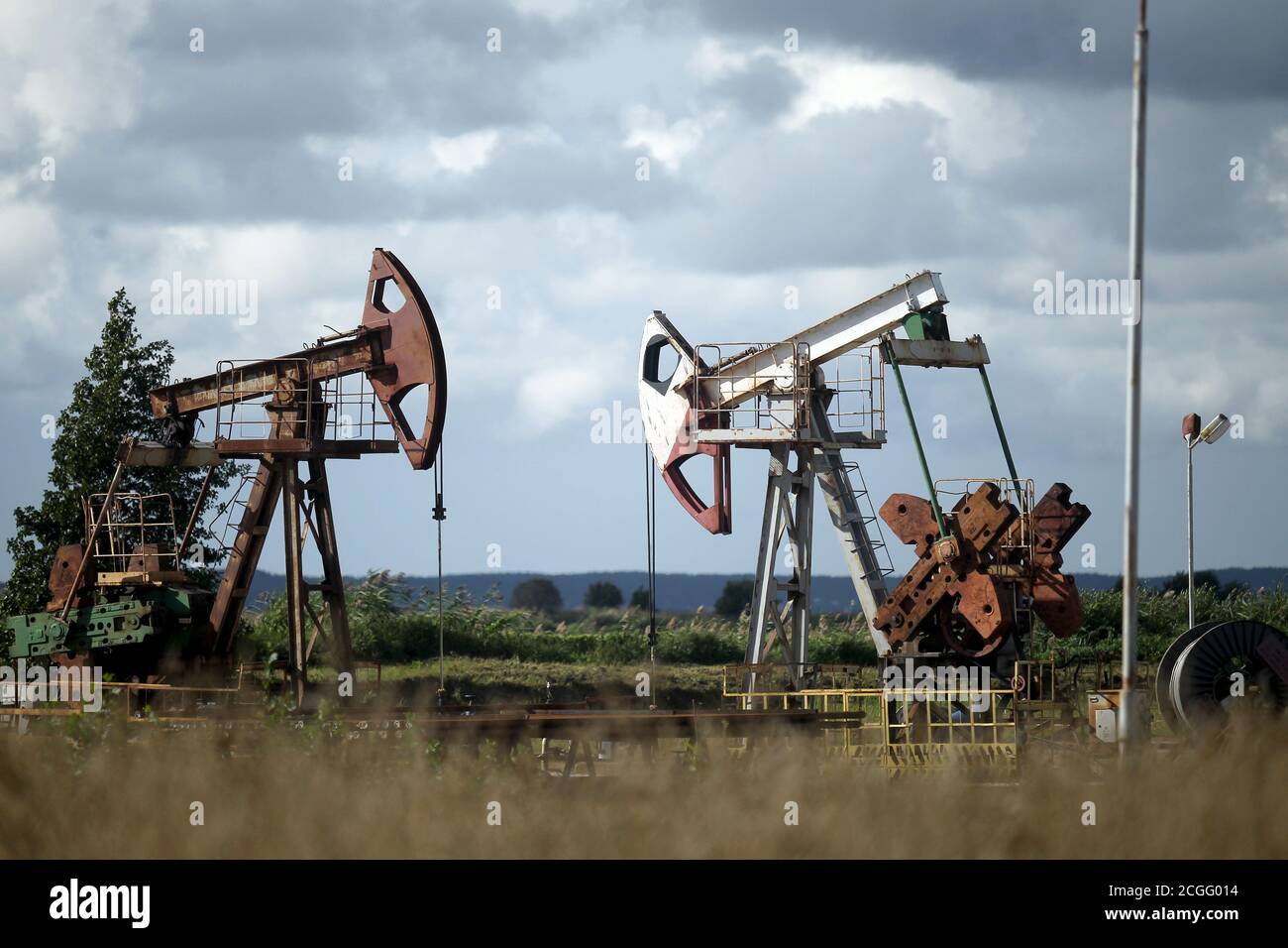 Oil pump jack - oil industry equipment, Lithuania Stock Photo - Alamy