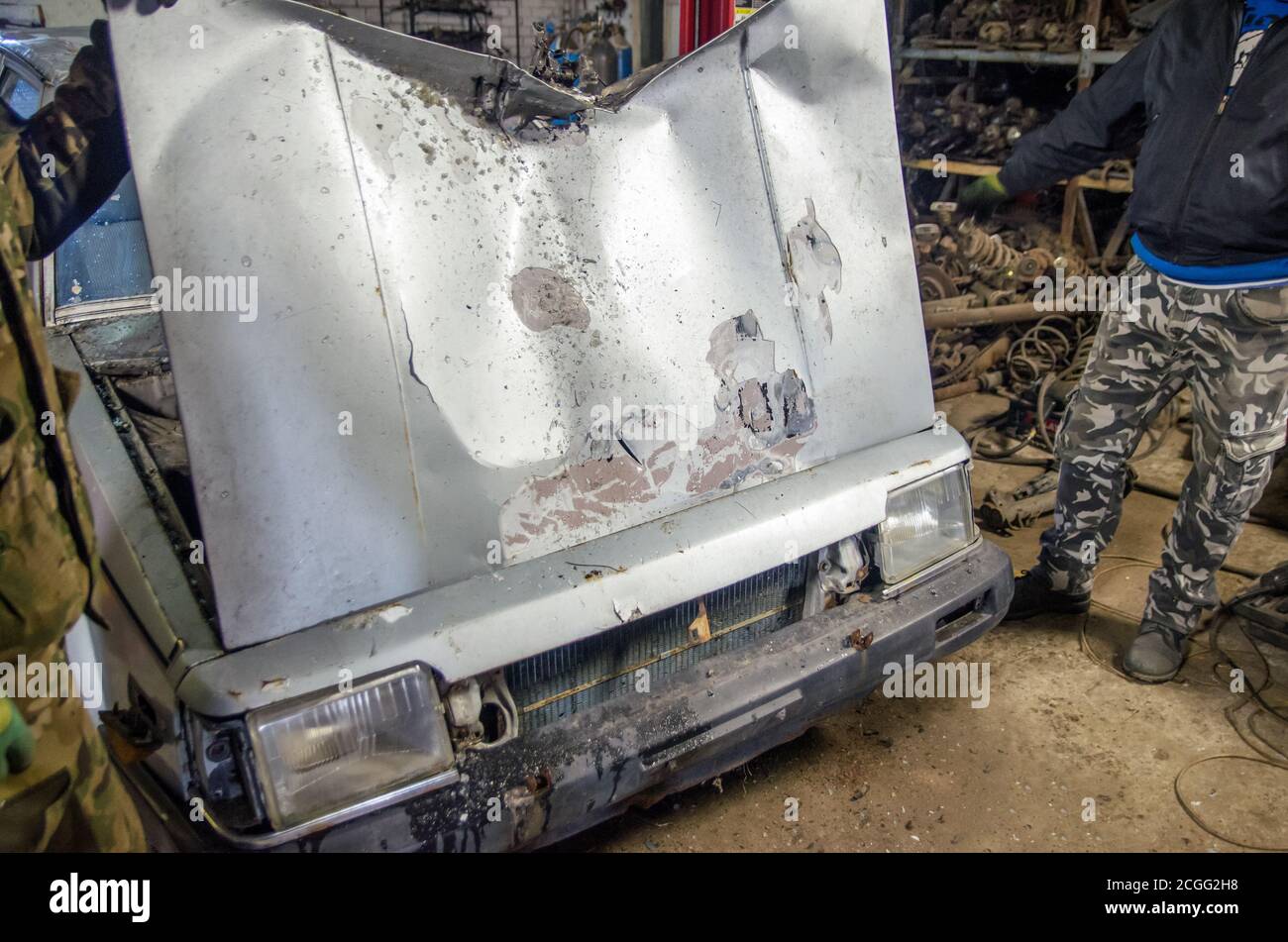 Rusty, damaged the hood of the car Stock Photo - Alamy