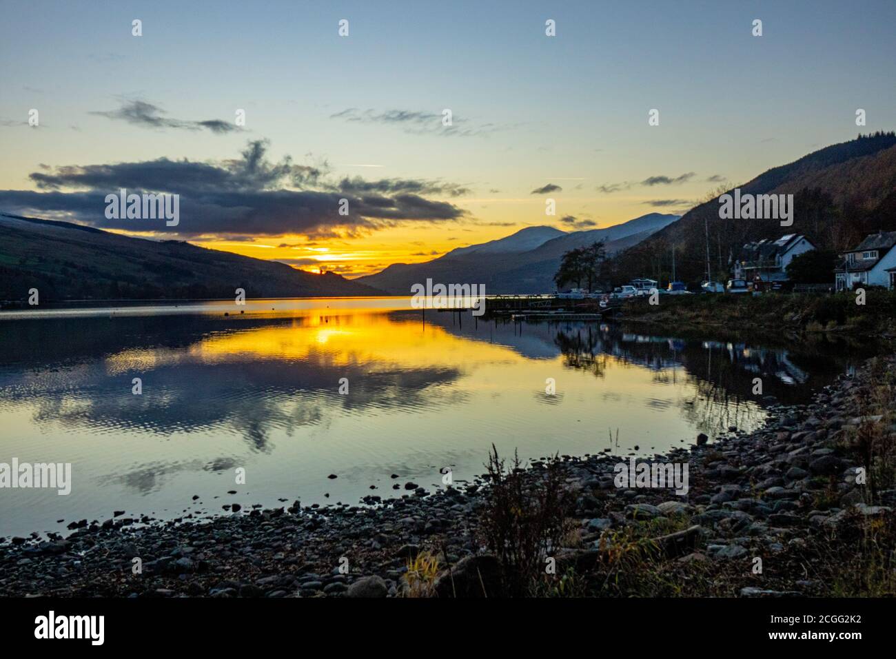 Setting sun over over Loch Tay at Kenmore Stock Photo - Alamy