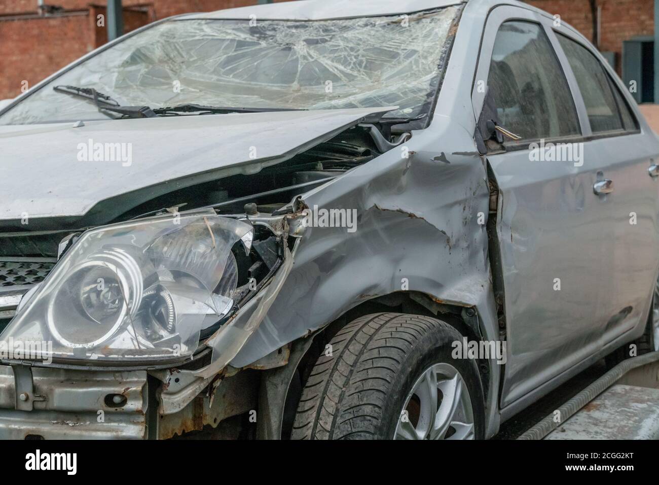 broken gray car close up. accident concept Stock Photo - Alamy
