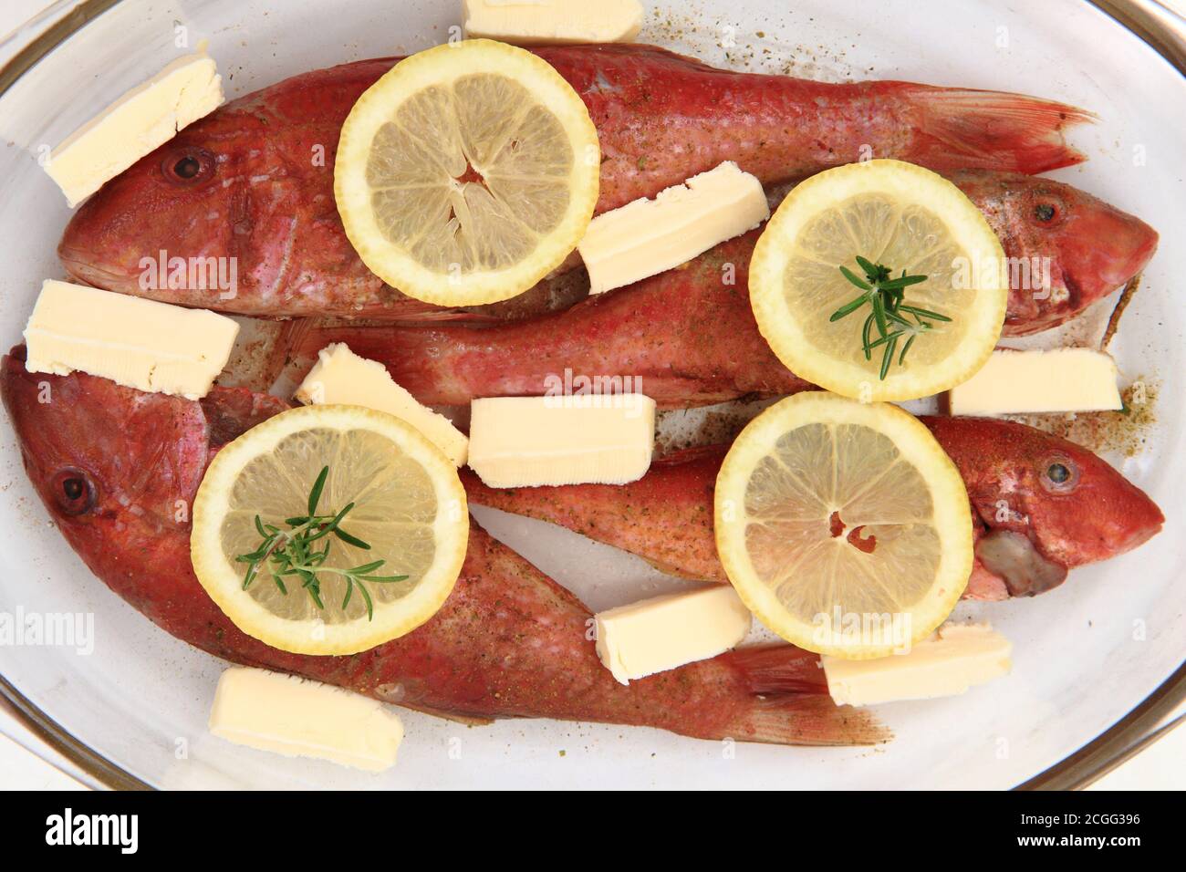 raw redfishes with lemon isolated on the white background Stock Photo ...