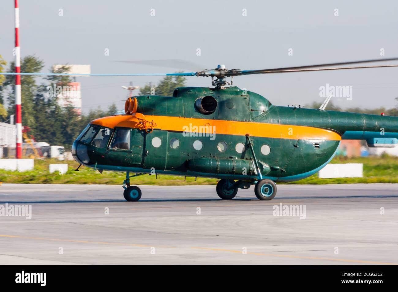 Helicopter taxiing on the airport apron Stock Photo - Alamy