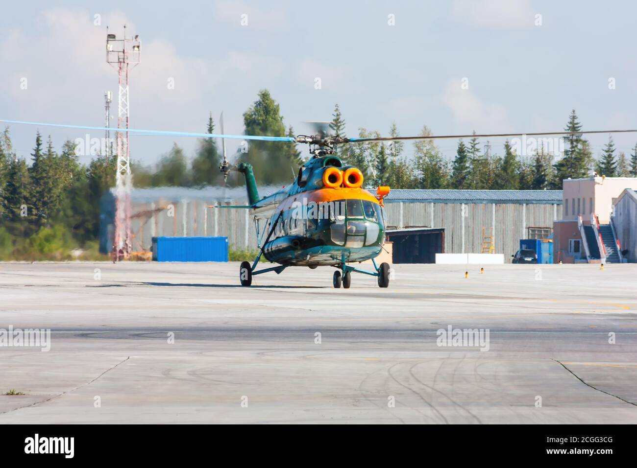 Helicopter taxiing on the airport apron Stock Photo - Alamy