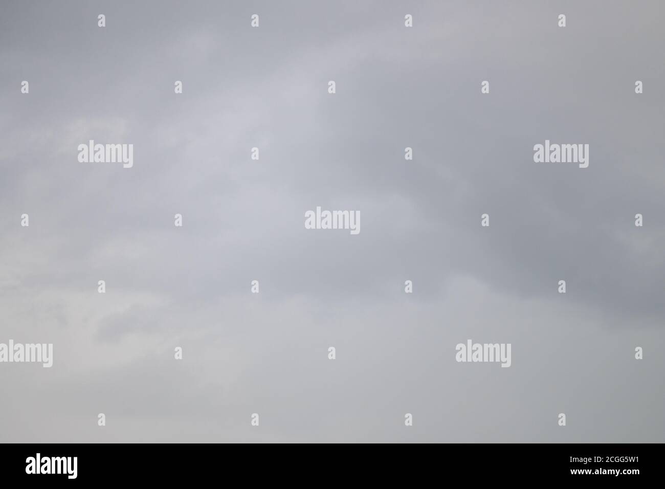 Background texture of an overcast stormy grey sky with dense cloud ...