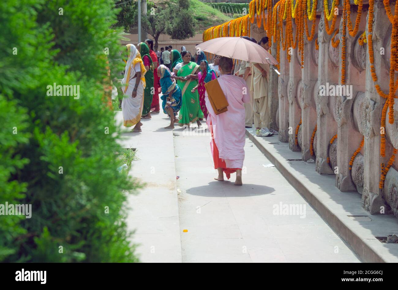 During the Buddha Purnima, a Cambodian lady monk walks to the Mahabodhi ...