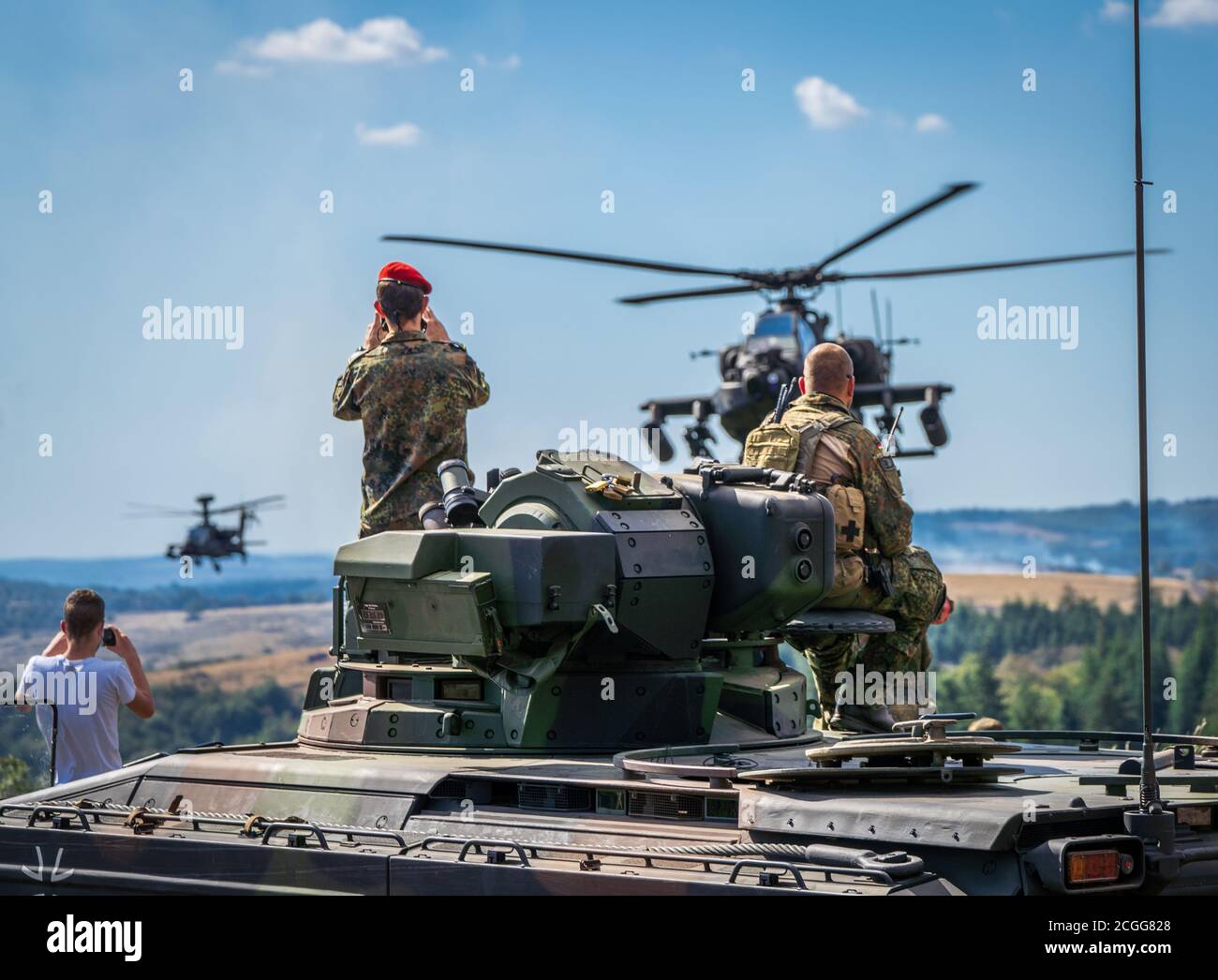 Two AH-64 Apaches from A Co, 1-3 Attack Reconnaissance Battalion make a ...