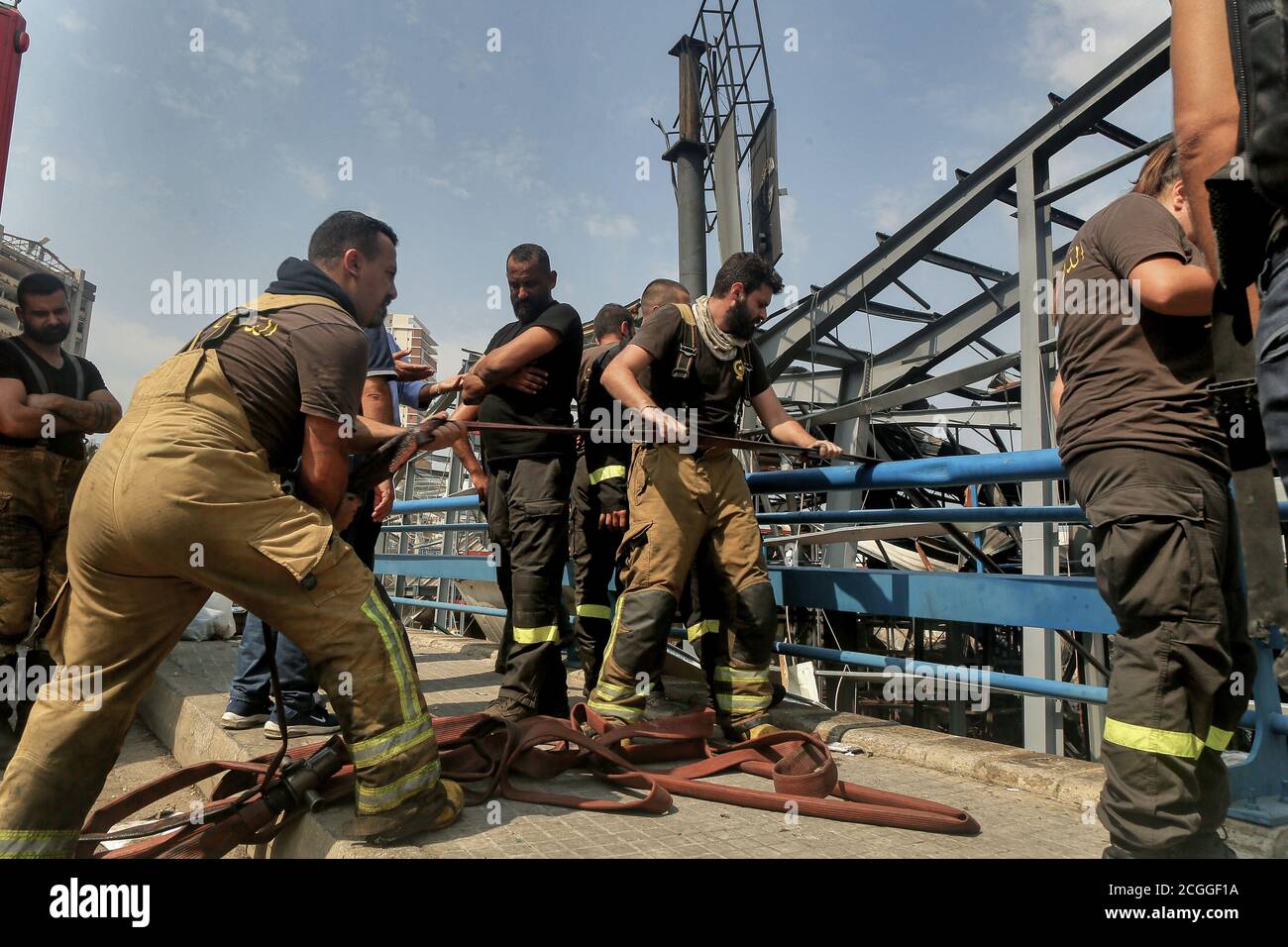 Beirut, Lebanon. 11th Sep, 2020. Civil defence volunteers douse the ...