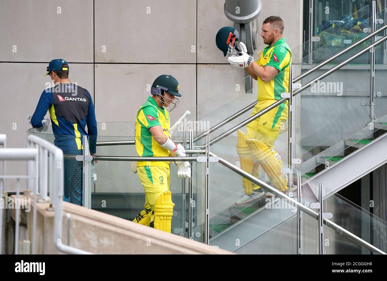 Australia's Aaron Finch and David Warner walk onto the pitch prior to ...