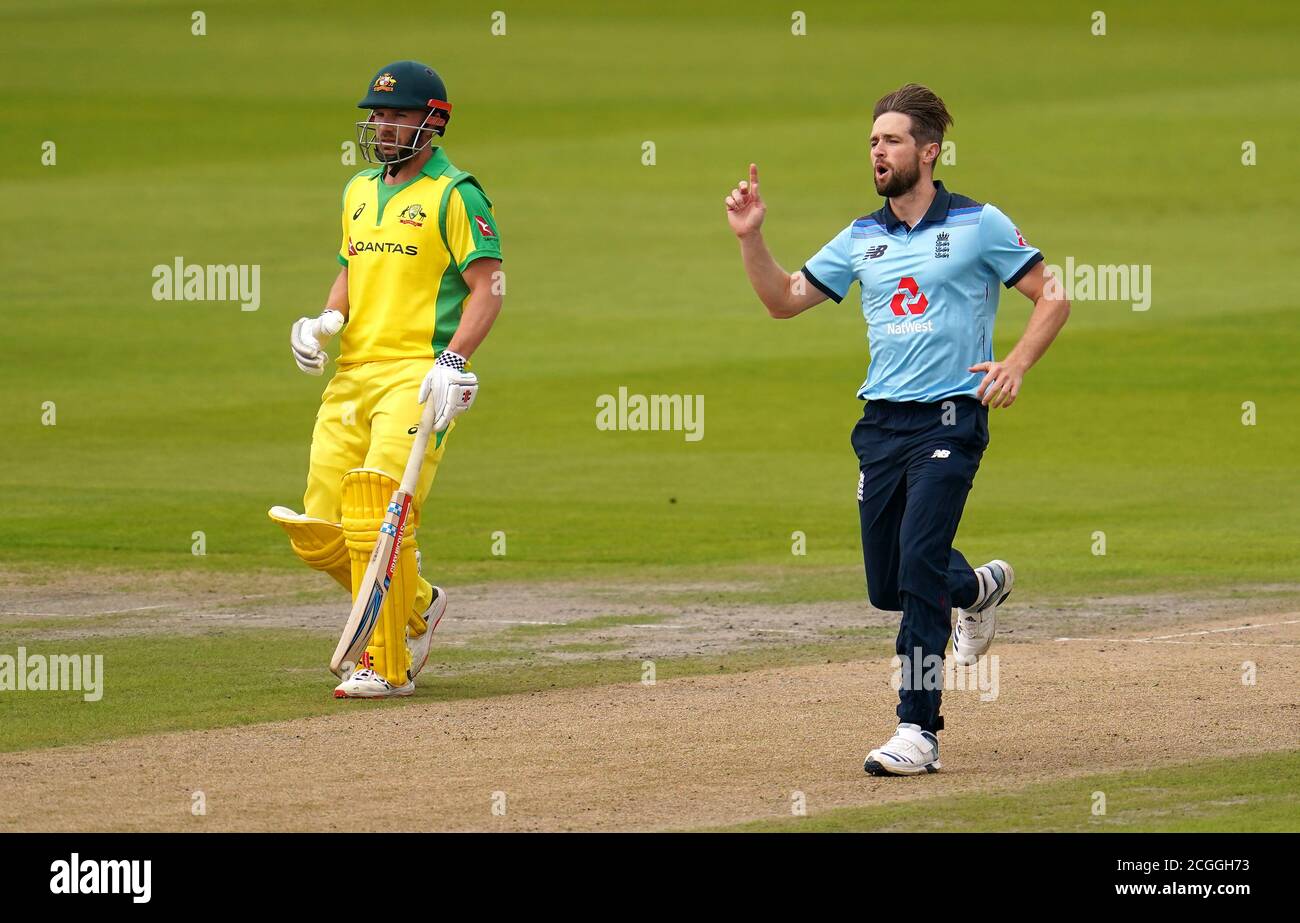 England's Chris Woakes after bowling to Australia's David Warner (not ...