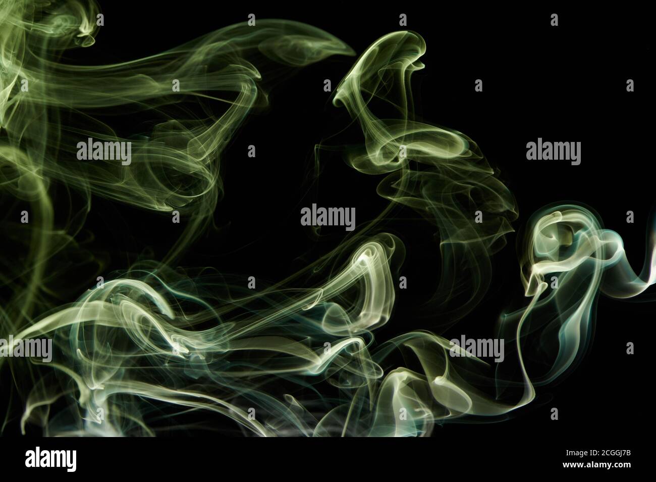 Abstract green smoke lines with smooth shape in black backdrop Stock ...