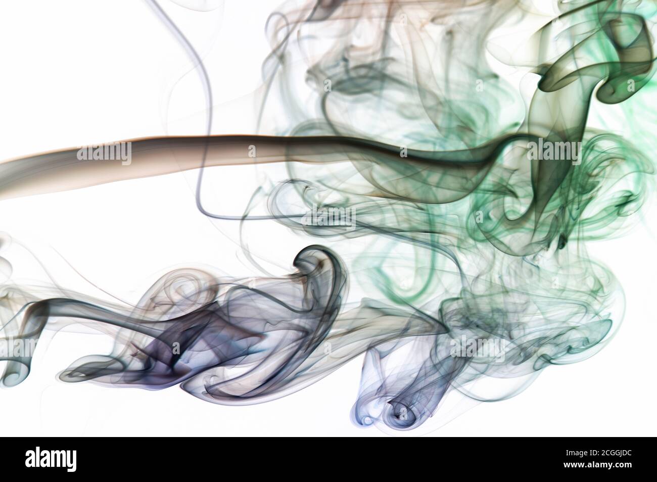 Dynamic smooth smoke swirls on white background isolated. Abstract ...