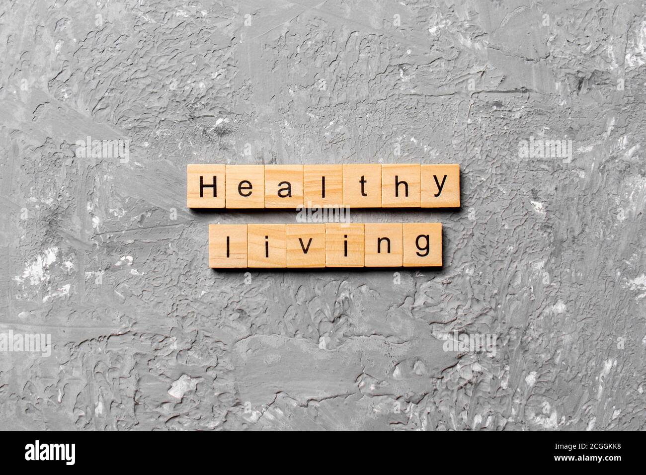 Healthy Living word written on wood block. Healthy Living text on ...