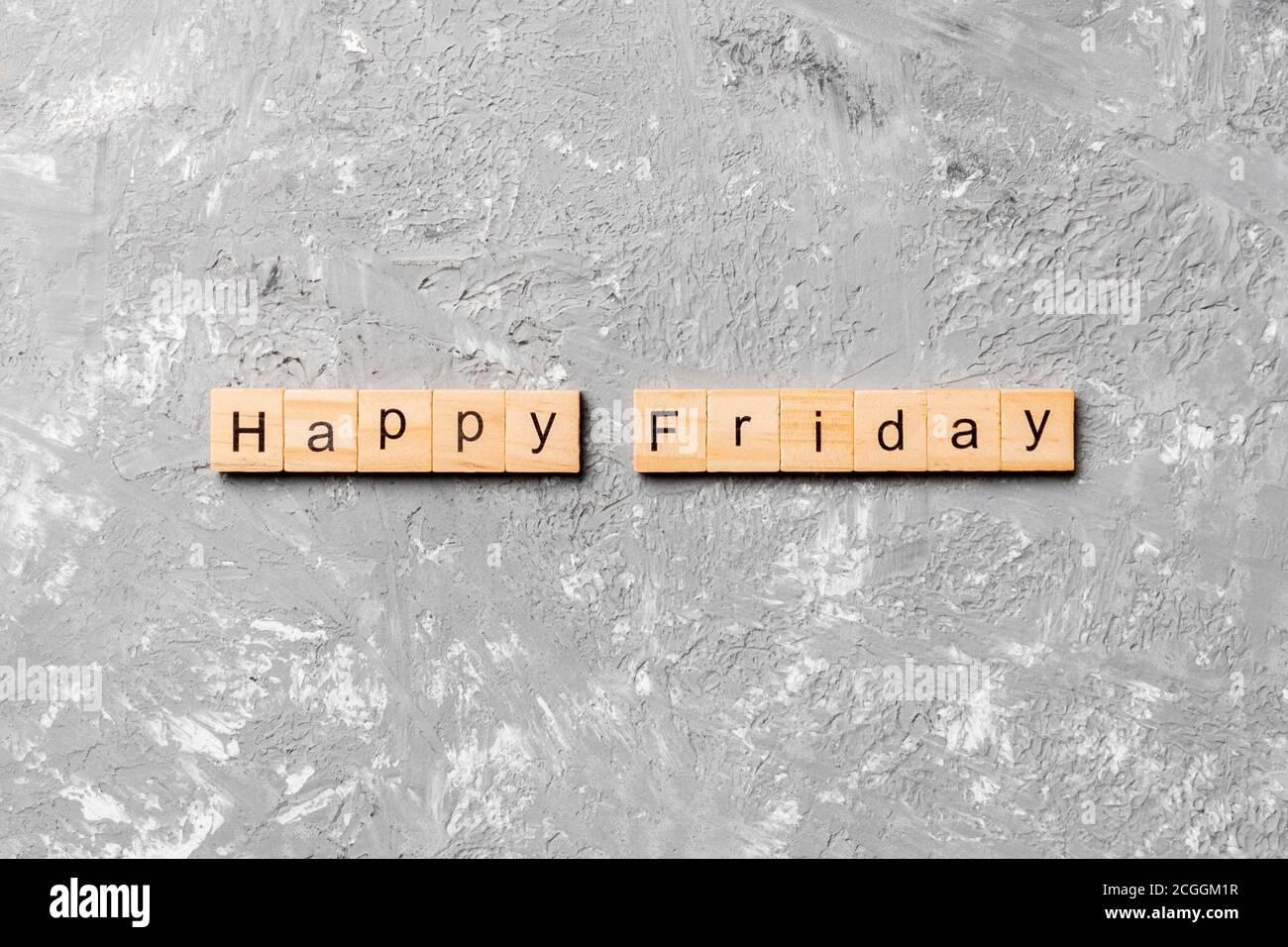 Happy friday word written on wood block. Happy friday text on cement ...